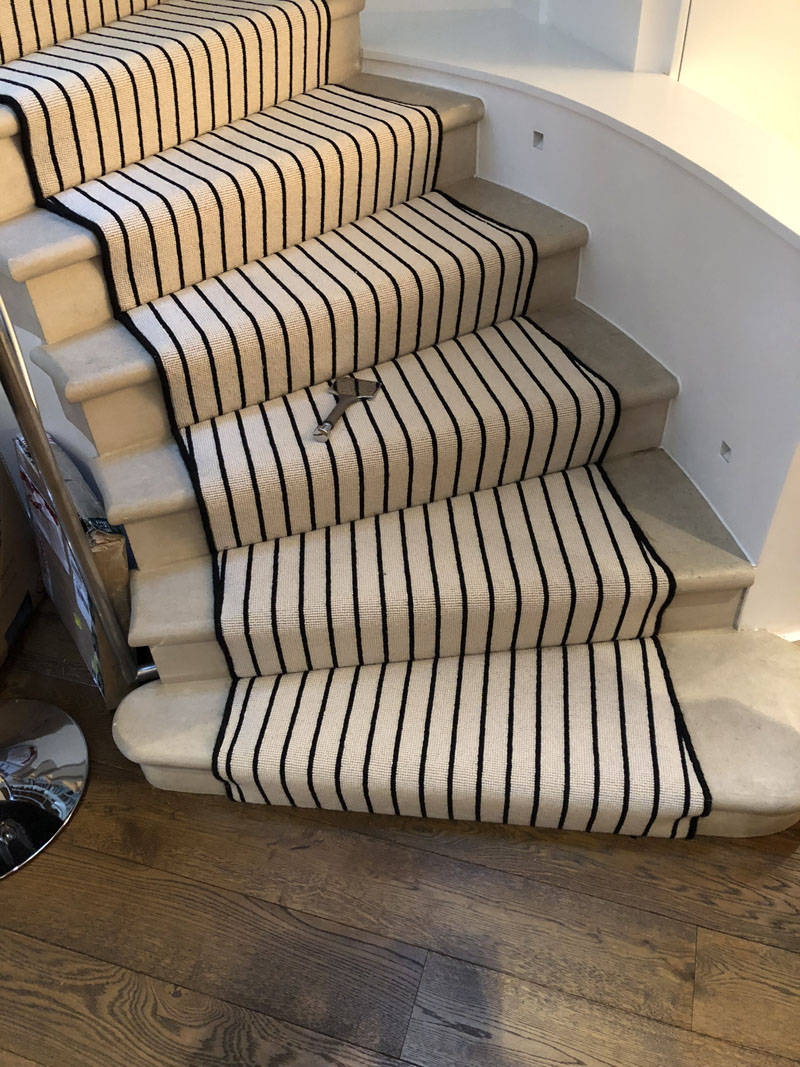 Black & White Striped Carpet Installed In Soho | The Flooring Group