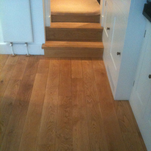 Solid Oak Planks Laid On An Unstable Living Room Floor | The Flooring Group