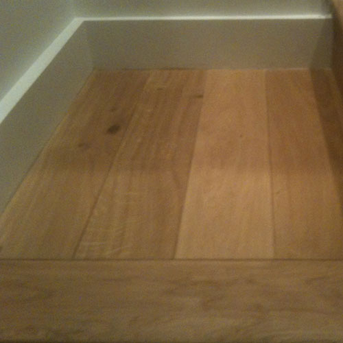 Solid Oak Planks Laid On An Unstable Living Room Floor | The Flooring Group